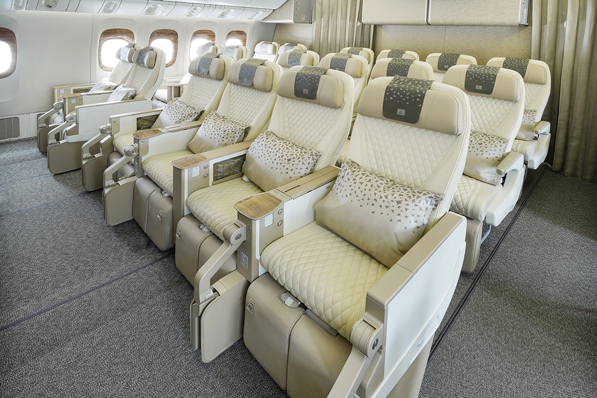Emirates debuts first retrofitted Boeing 777 with new premium cabins to ...