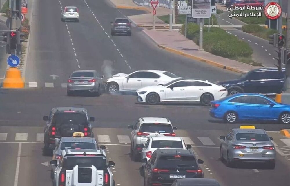 Abu Dhabi Police warn distracted drivers as red-light fines hit $13,600 ...