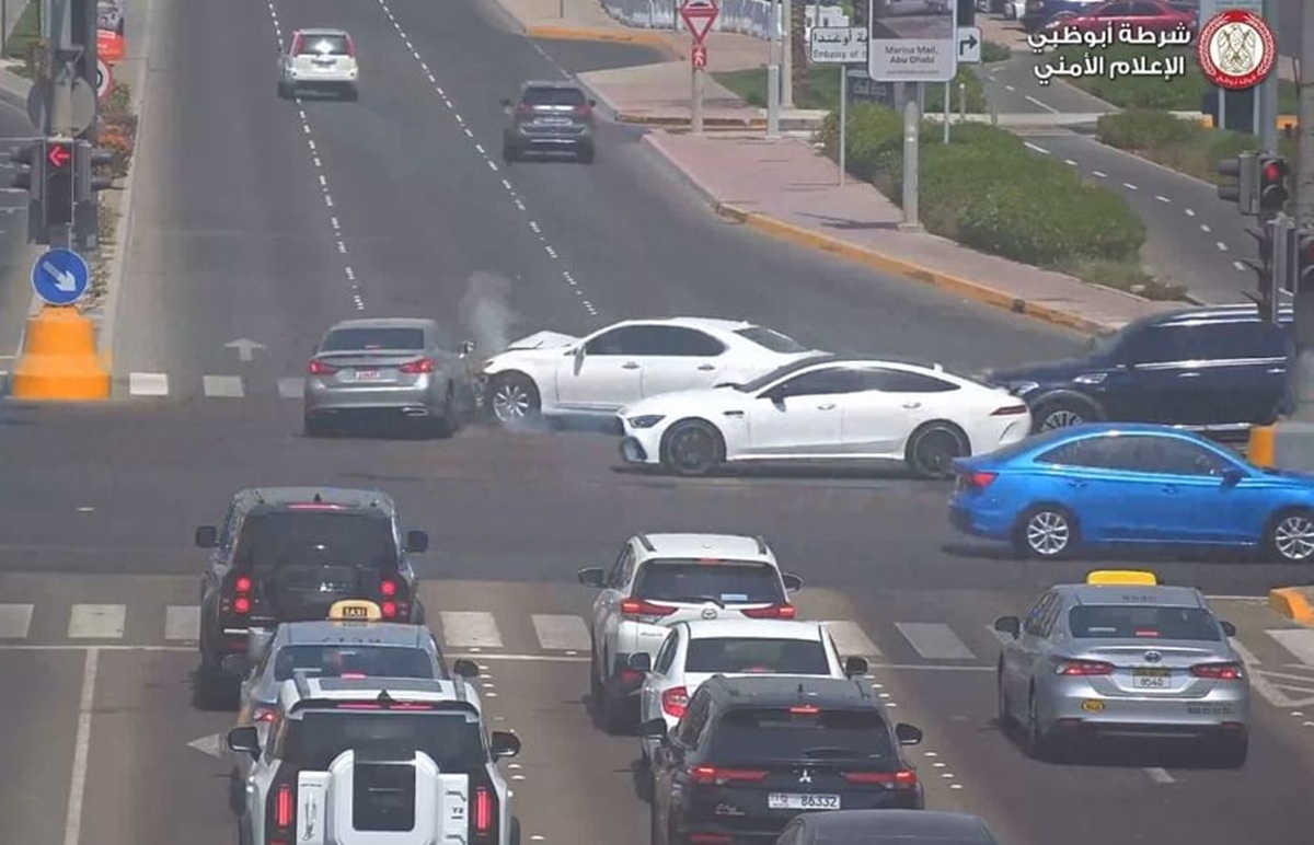 Abu Dhabi Police warn distracted drivers as red-light fines hit $13,600 ...
